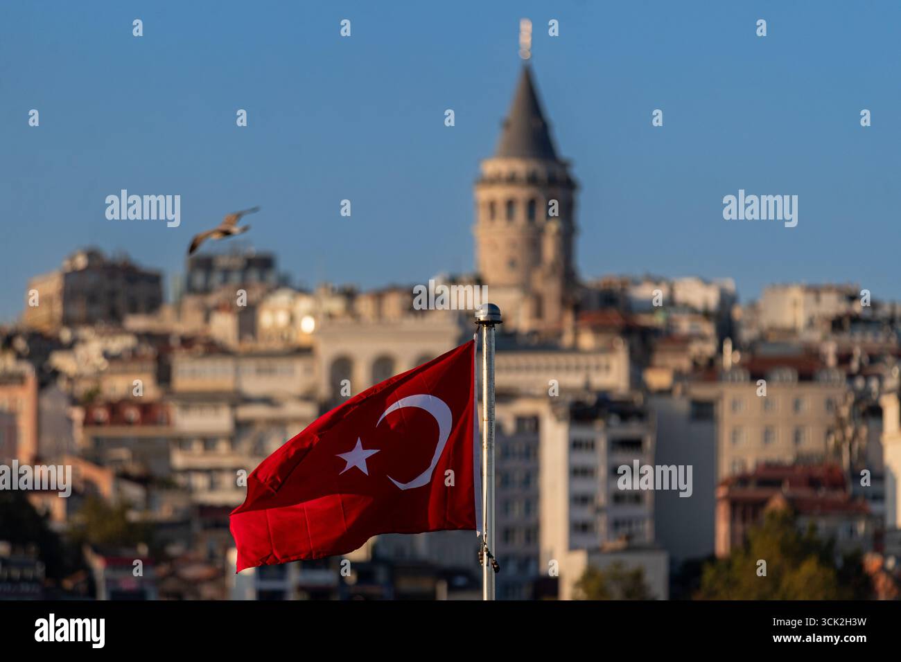 The Turkish flag and the historic Galata Tower. (Photo by Tunahan ...