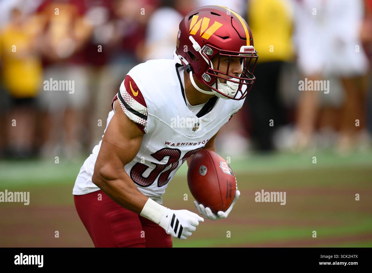 Washington Commanders running back Austin Ekeler (30) warms up before ...