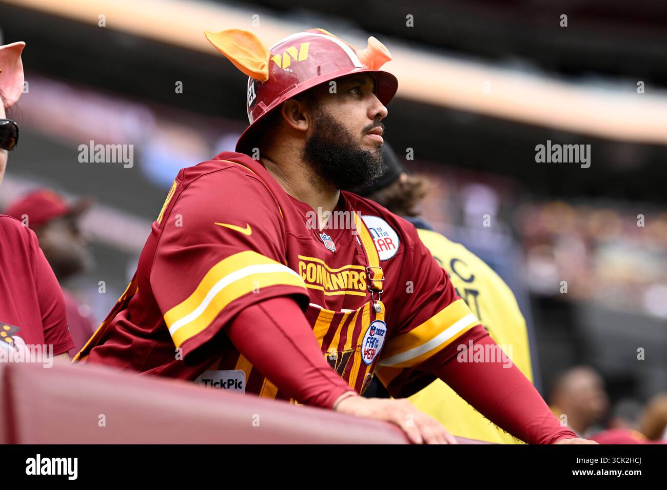 A spectator watches during an NFL football game between the Washington ...