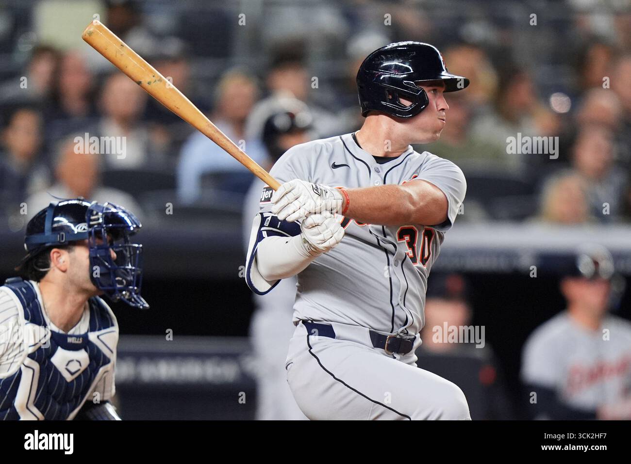 Detroit Tigers' Kerry Carpenter follows through on a two-run triple ...