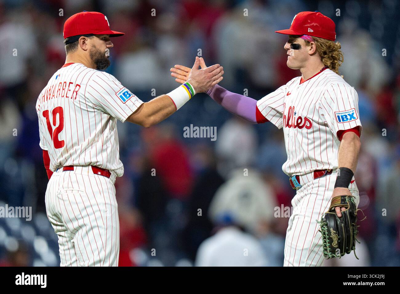 Philadelphia Phillies' Kyle Schwarber, left, celebrates the win with ...