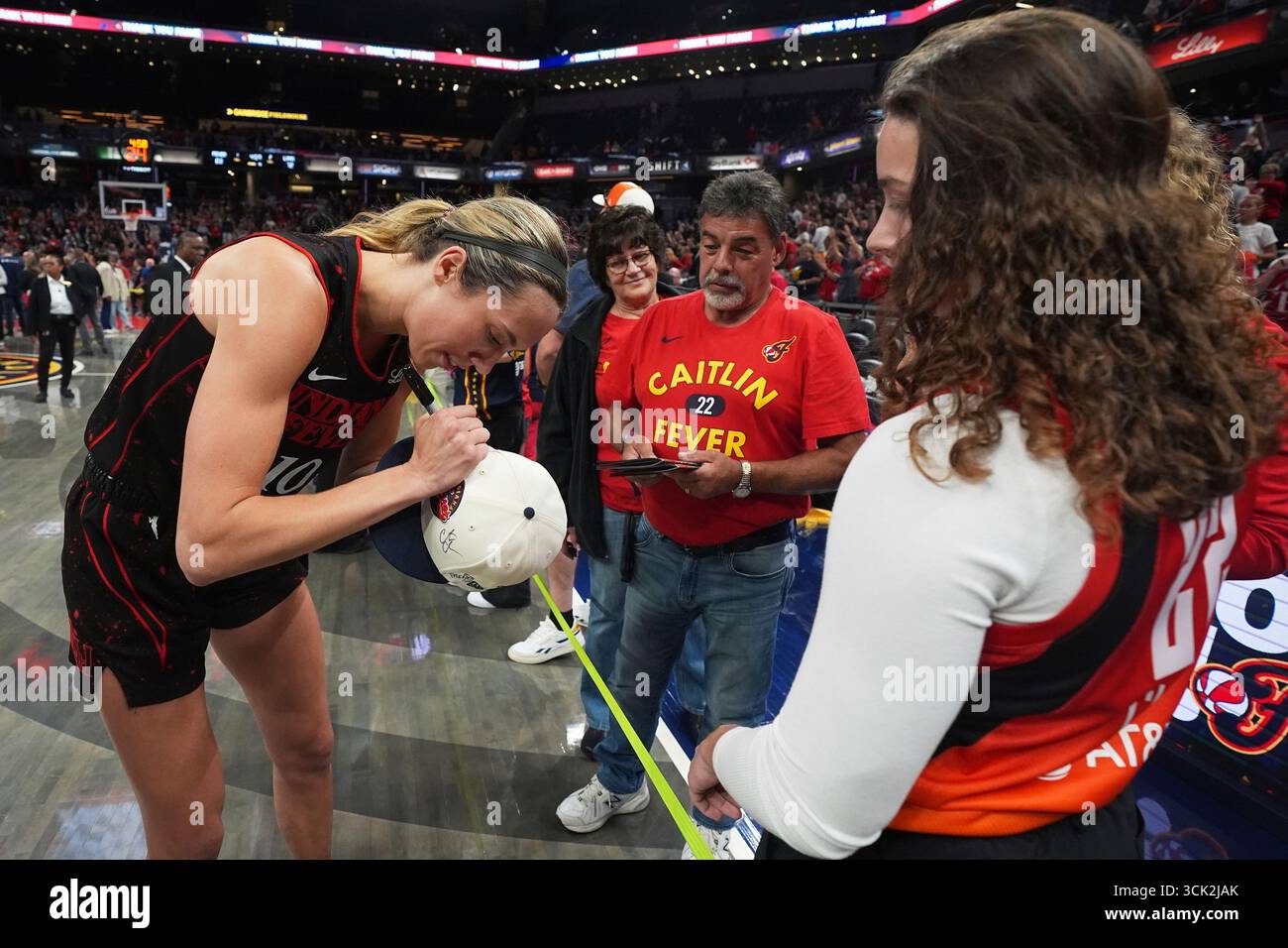 Indiana Fever's Lexie Hull signs autographs for fans following a WNBA ...