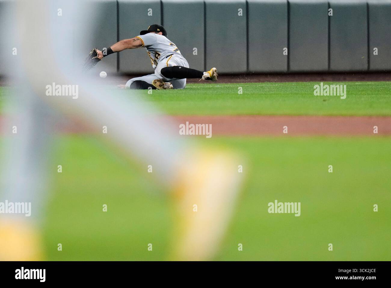 Pittsburgh Pirates left fielder Tommy Pham is unable to catch a fly ...