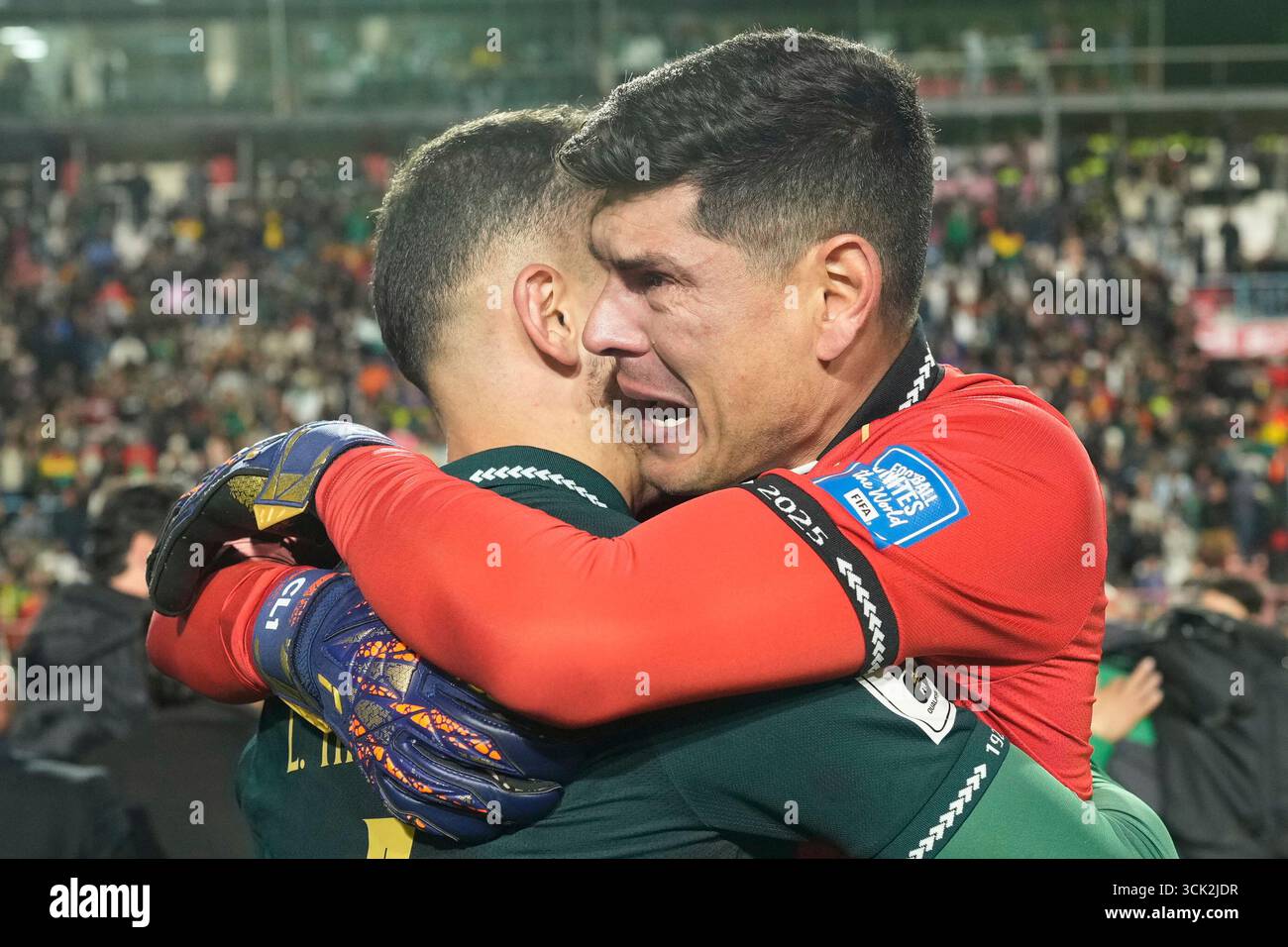 Bolivia's goalkeeper Carlos Lampe, right, embraces teammate Luis Haquin ...