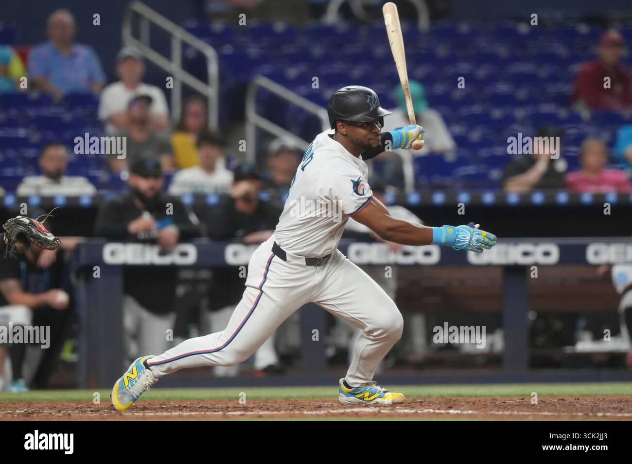 Miami Marlins second baseman Otto Lopez (6) hits a single to right ...