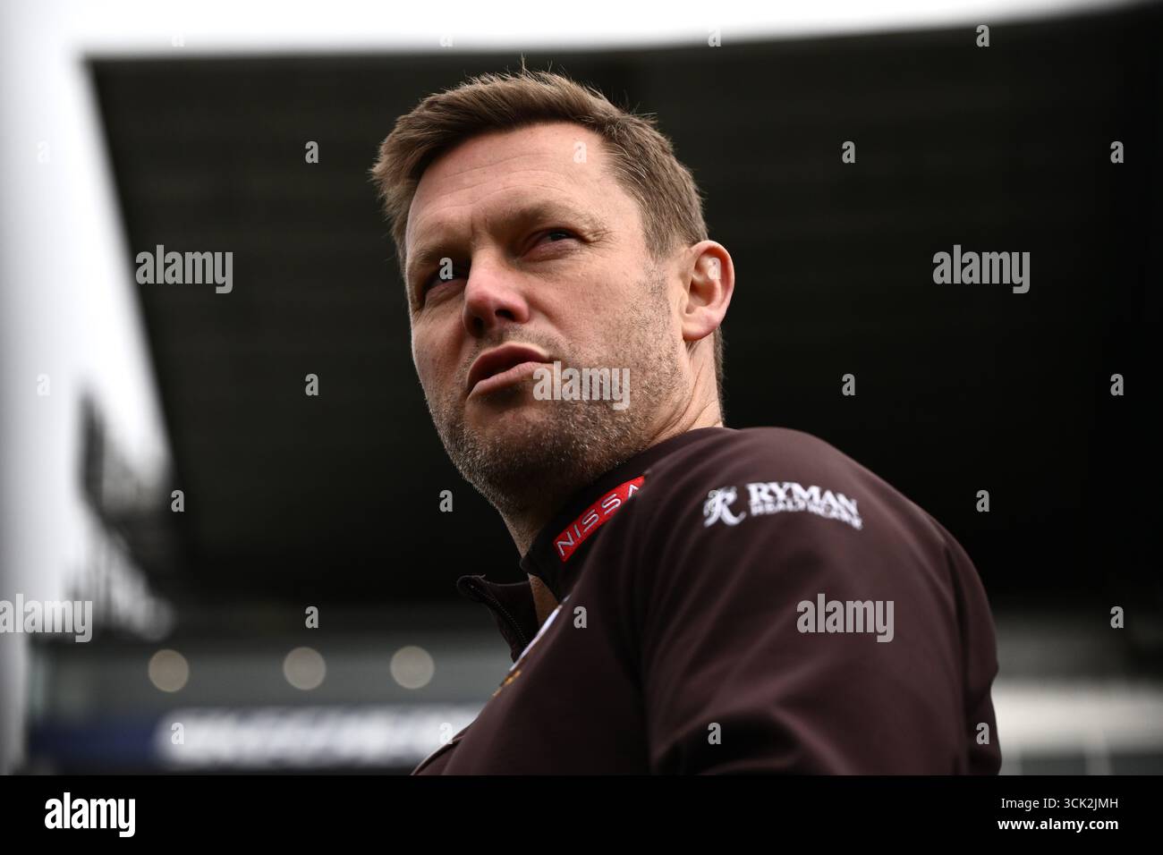 Hawthorn head coach Sam Mitchell speaks to media during an AFL training ...