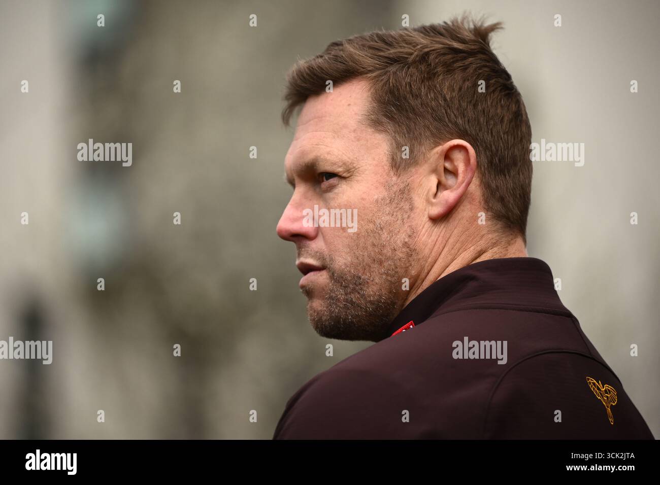 Hawthorn head coach Sam Mitchell speaks to media during an AFL training ...