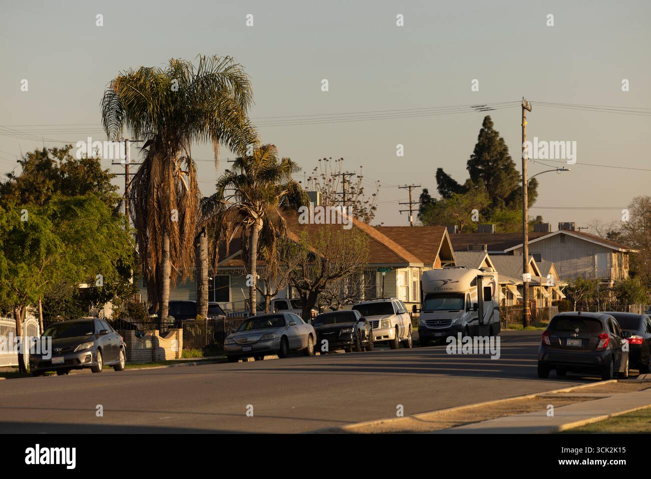 Delano, California, USA - March 3, 2024: Late afternoon traffic passes ...