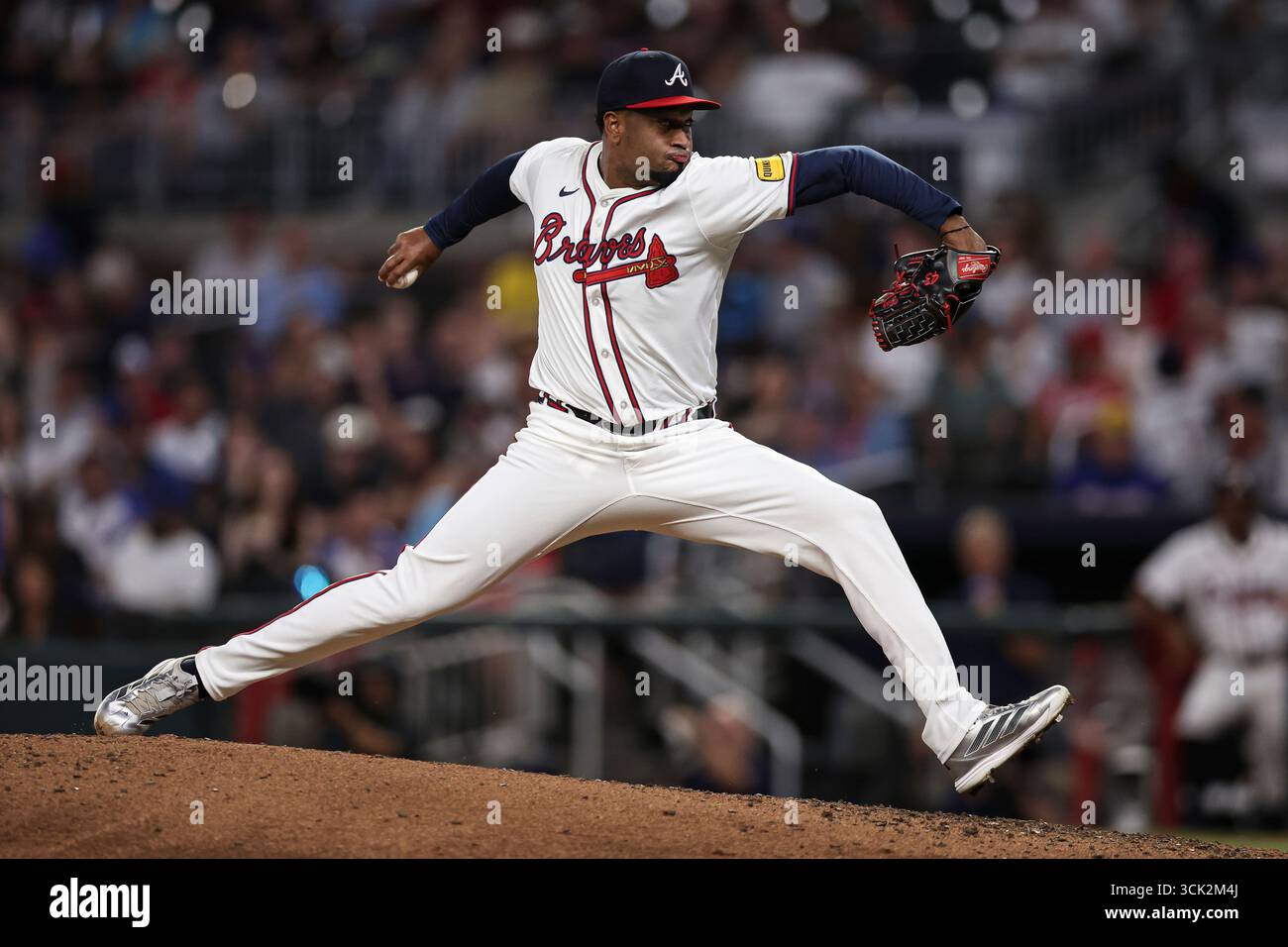 Atlanta Braves pitcher Alexis Díaz delivers in the eighth inning of a ...