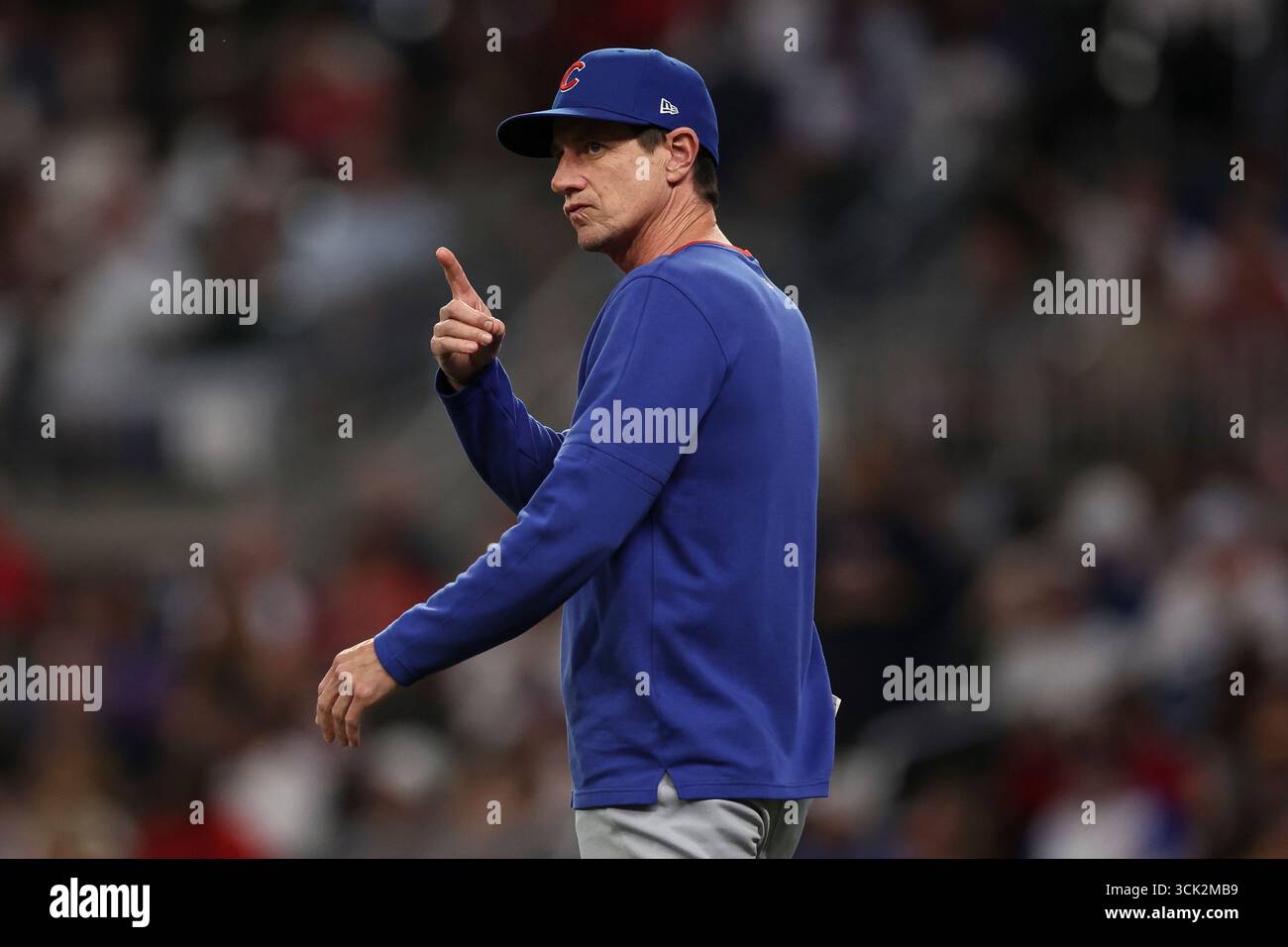 Chicago Cubs manager Craig Counsell signals for a pitching change in ...