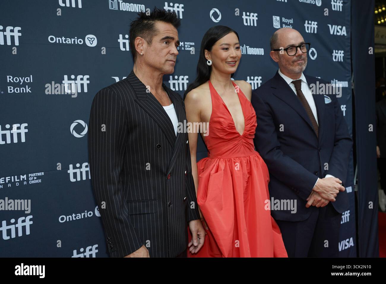 (L-R) Colin Farrell, Fala Chen and Edward Berger attend the red carpet for the ‘Ballad of a ...