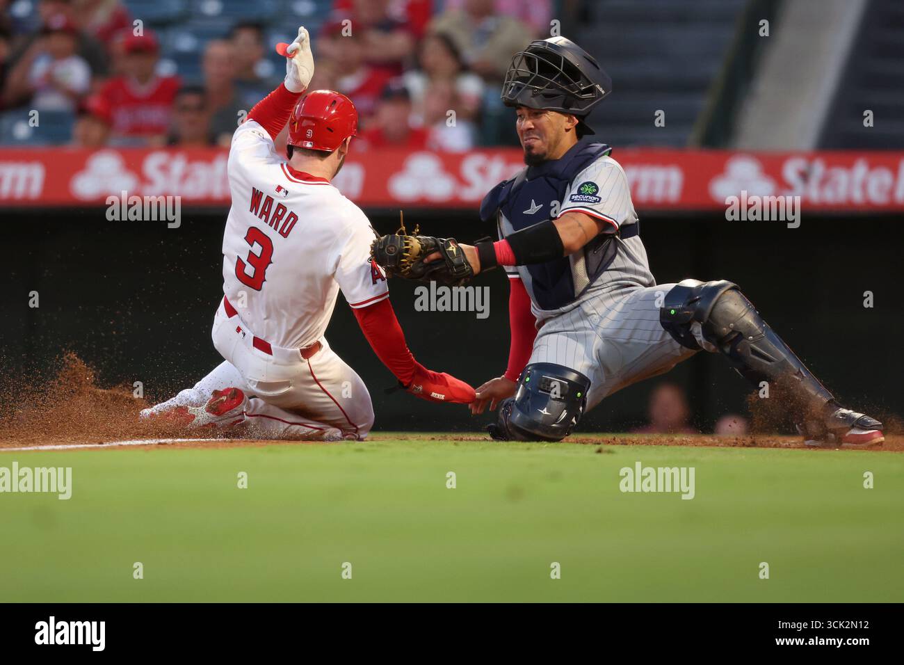 Los Angeles Angels' Taylor Ward (3) steals home as Minnesota Twins ...