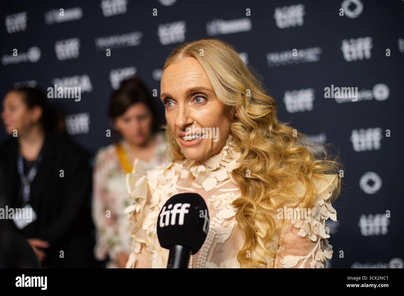 Toni Collette arrives on the red carpet for "Wayward" at the Toronto ...