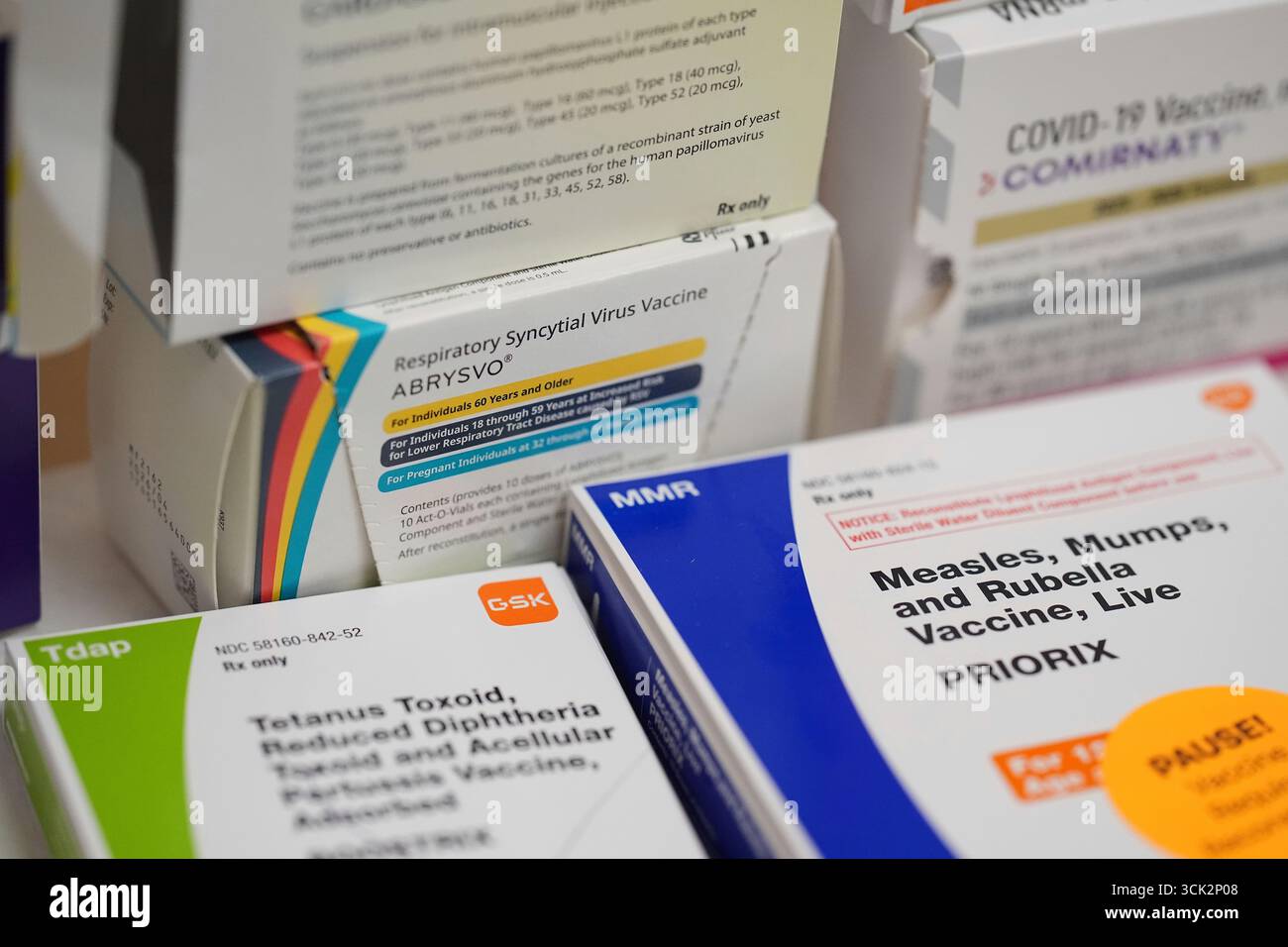 Boxes of various vaccines are seen inside a CVS pharmacy, Tuesday, Sept ...
