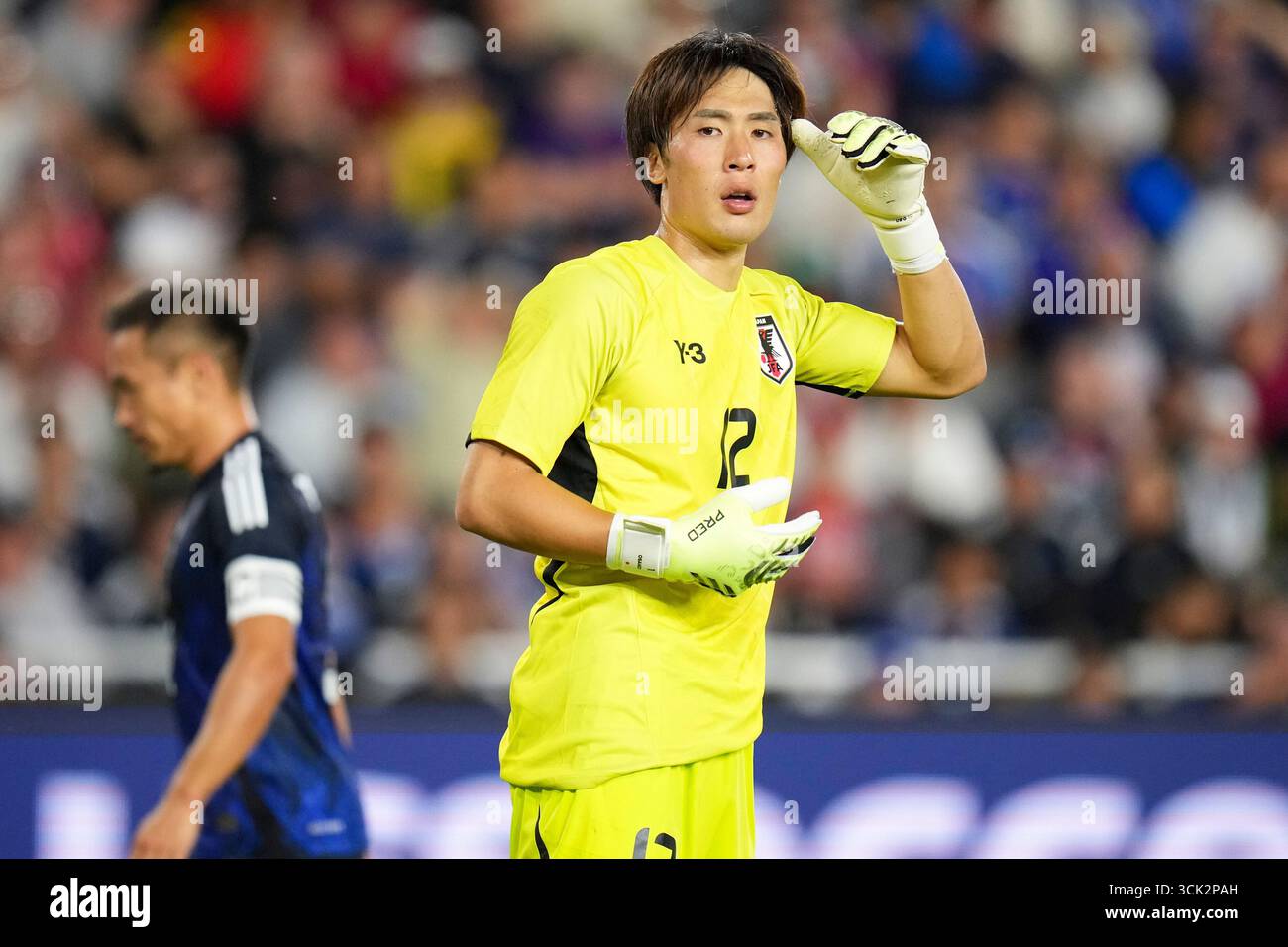 Japan goalkeeper Keisuke Osako looks on during the first half of a ...