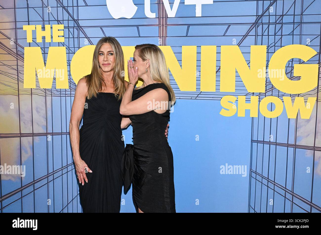 Jennifer Aniston, left, and Reese Witherspoon attend the Apple TV+ ...
