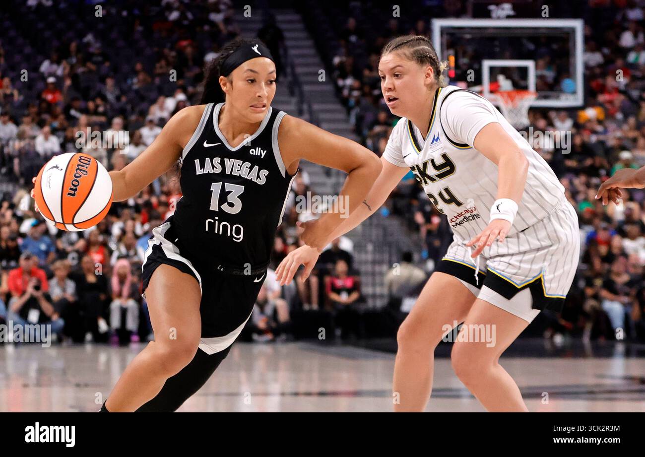 Las Vegas Aces guard Aaliyah Nye (13) drives against Chicago Sky guard ...