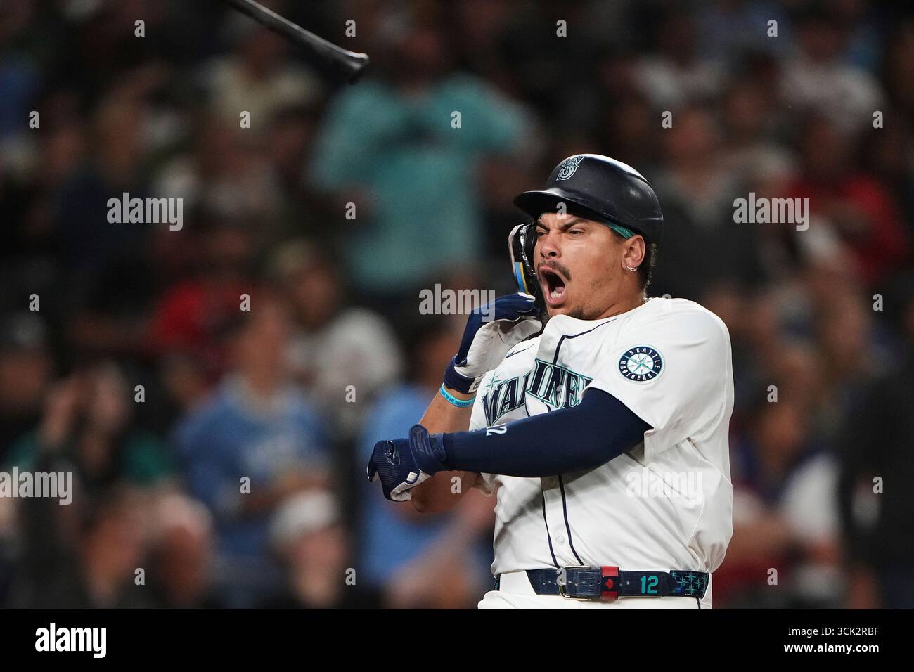 Seattle Mariners' Josh Naylor reacts after hitting a solo home run ...