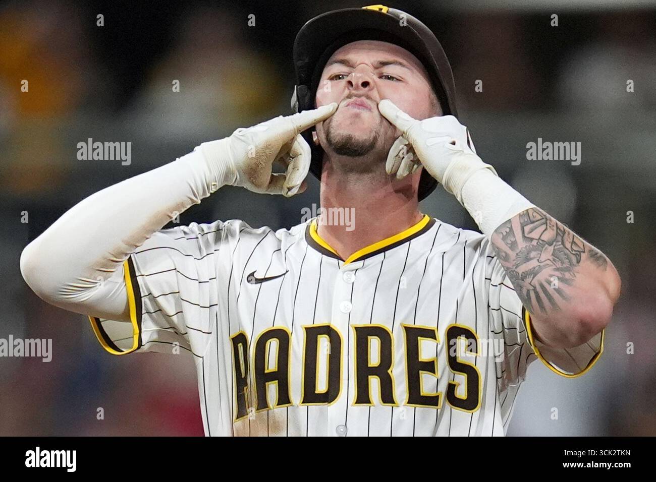 San Diego Padres' Jackson Merrill celebrates after hitting a double ...