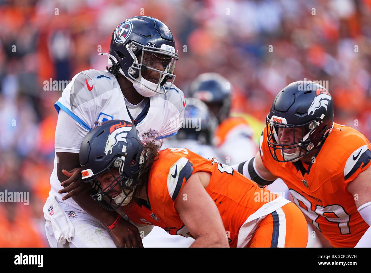 Denver Broncos linebacker Alex Singleton (49) hits Tennessee Titans ...