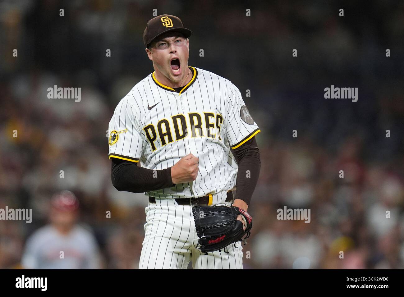 San Diego Padres relief pitcher Mason Miller celebrates after striking ...