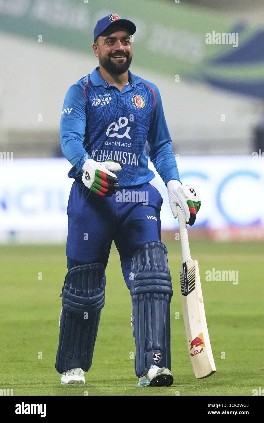 Afghanistan's Rashid Khan leaves the ground during the Asia Cup Cricket ...