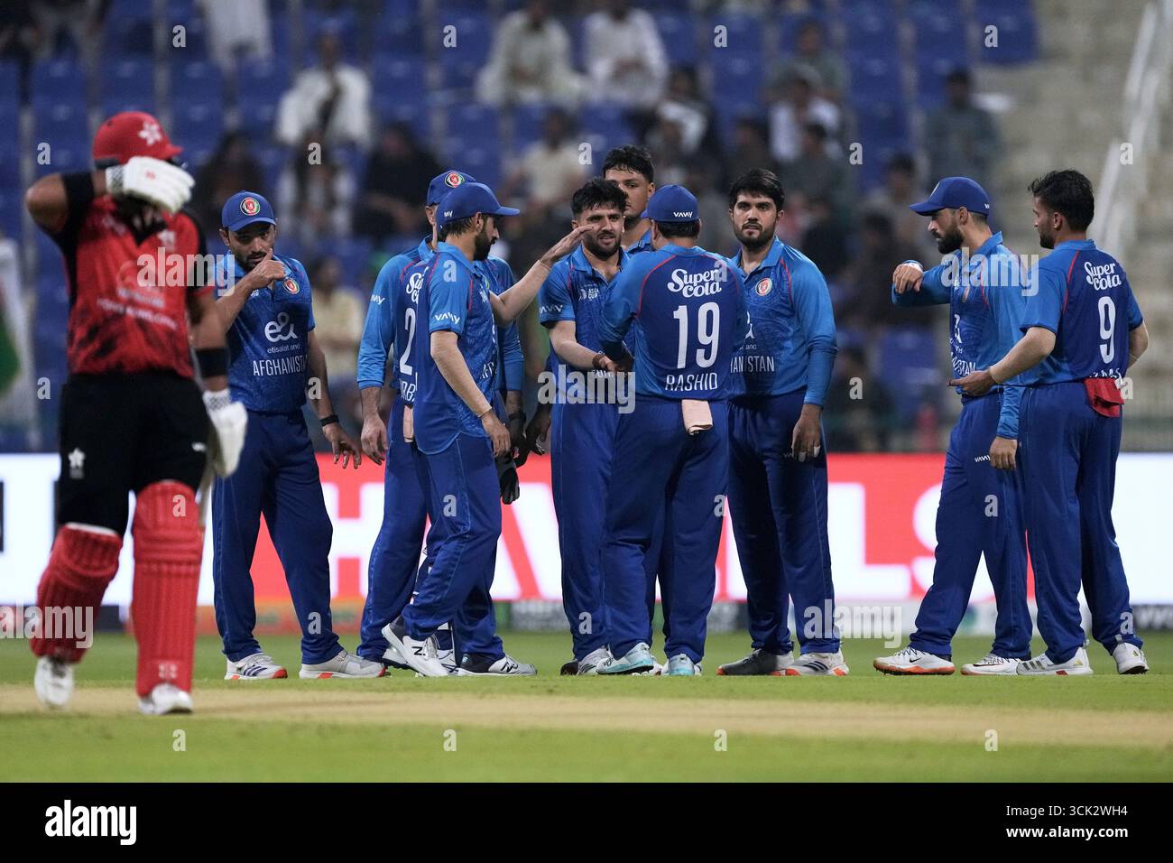 Hong Kong's Anshuman Rath walks off the field after losing his wicket ...