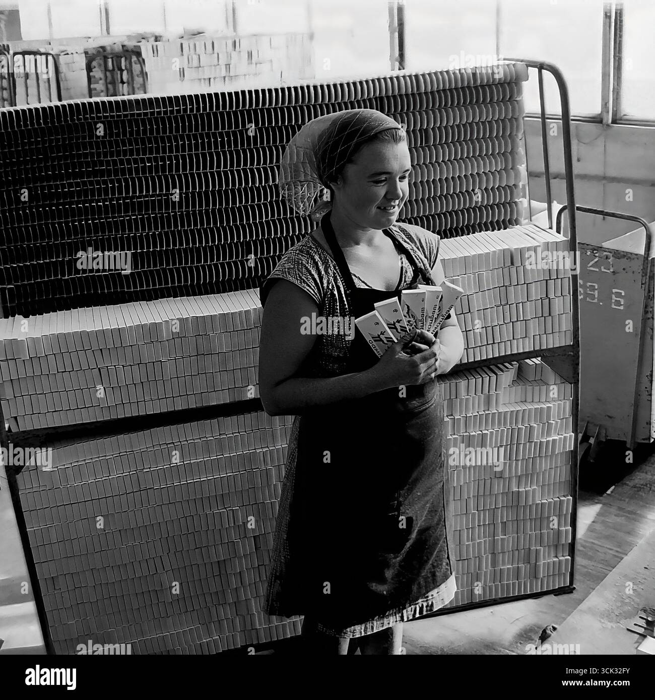 A worker at the Sloviansk Pencil Factory (Ukrainian SSR) proudly ...