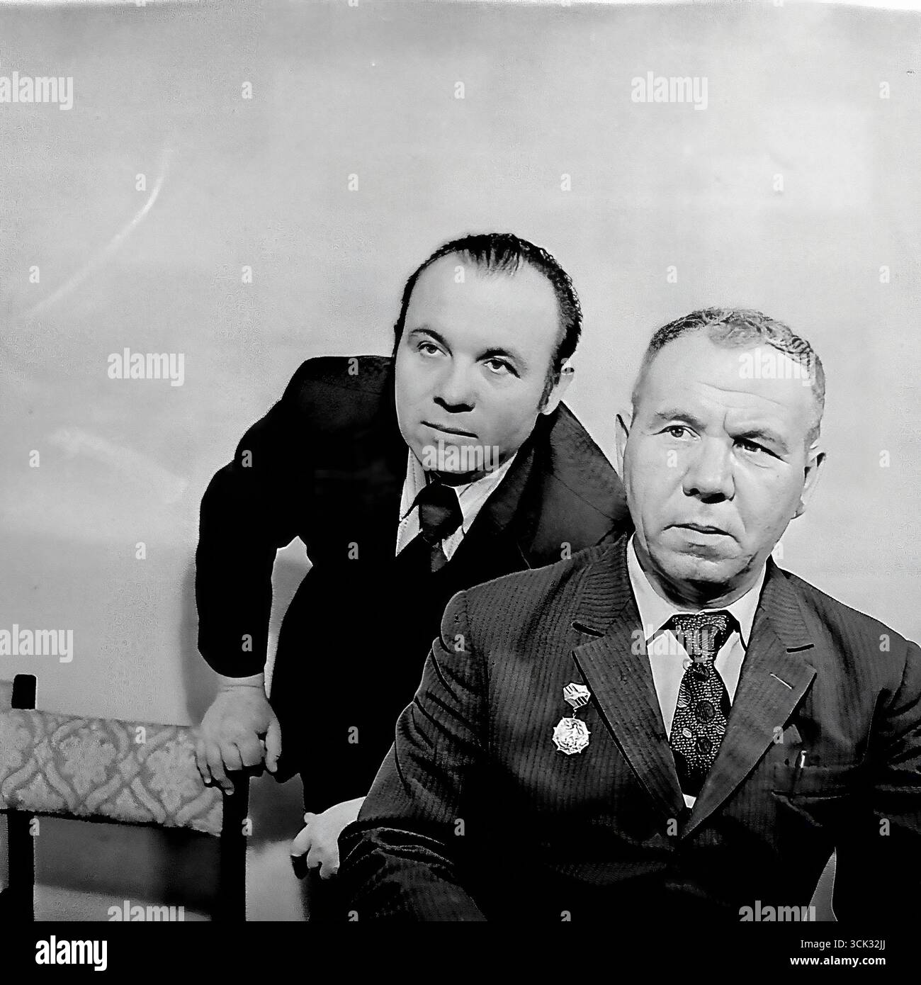 An official double portrait of two Soviet managers or party ...