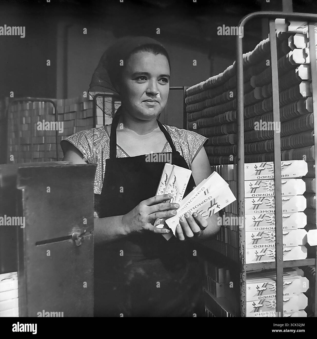A worker at the Sloviansk Pencil Factory (Ukrainian SSR) proudly ...