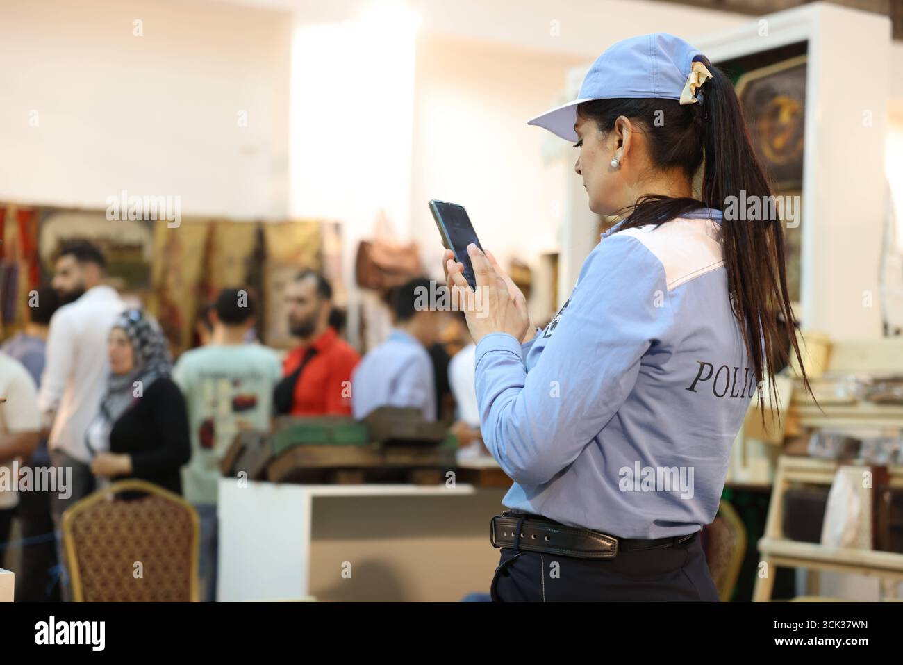 Syrian female officer in blue tourist police uniform at Damascus ...