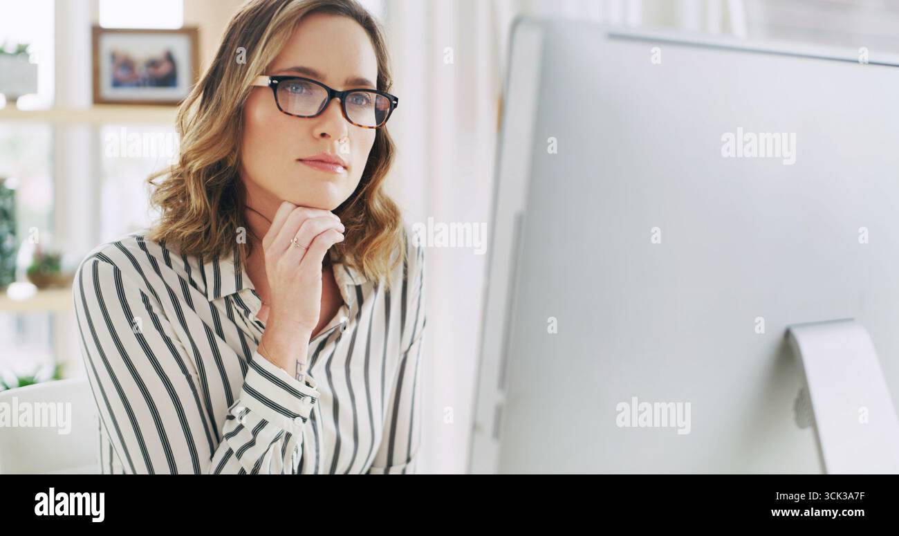 Woman, freelancer and reading on computer at house for research, editor ...