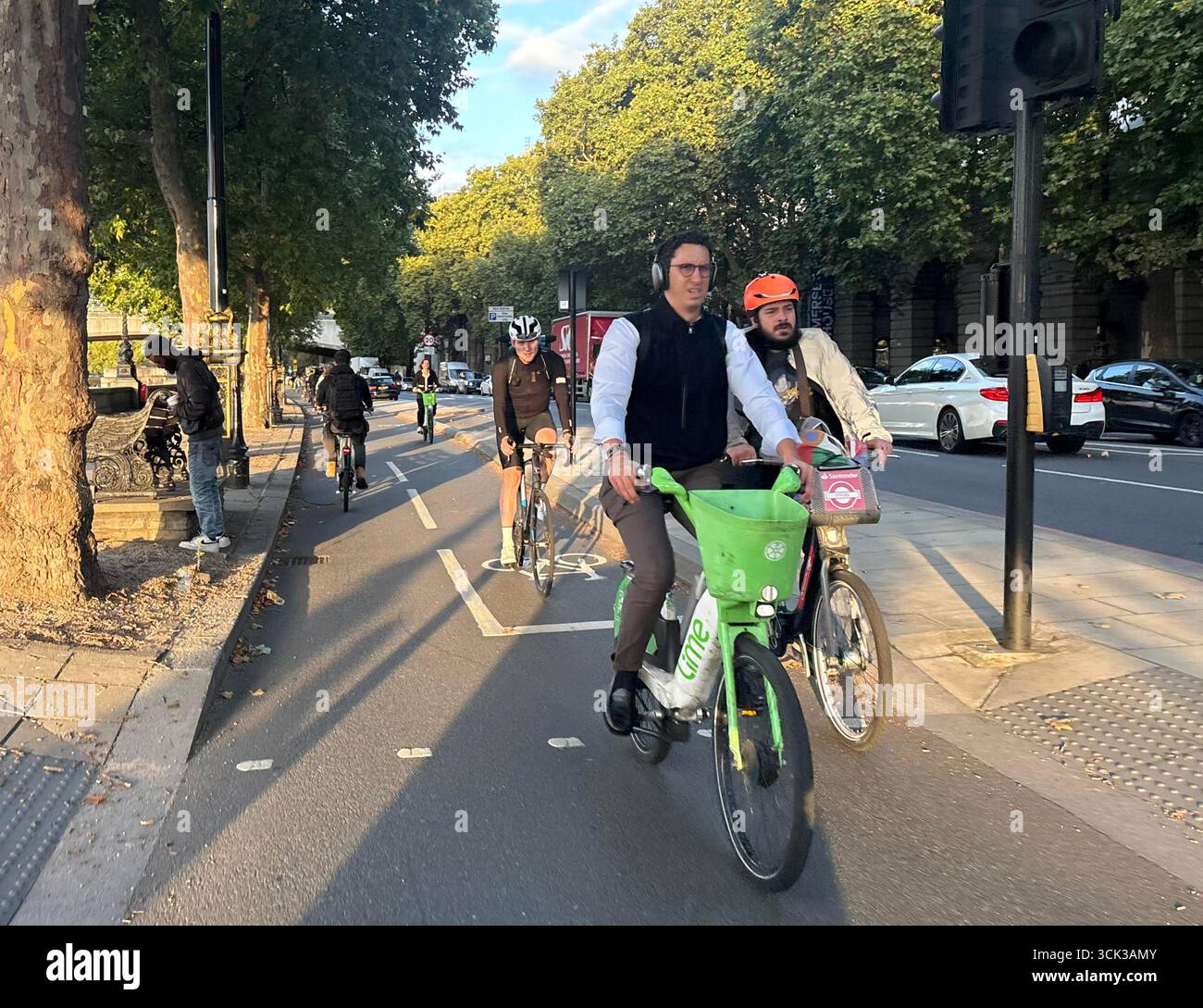People cycle along the Embankment, central London, on the third full ...