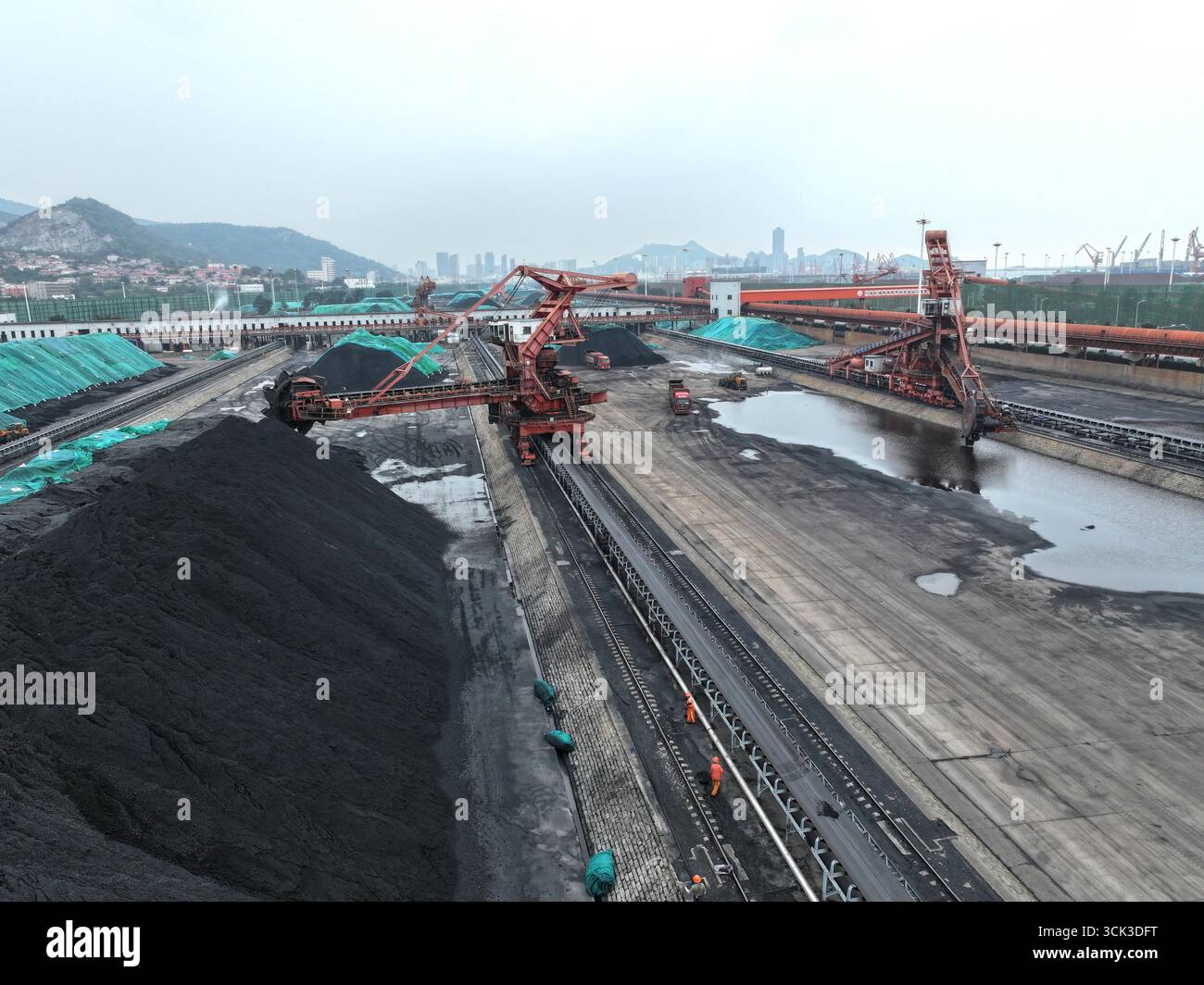 Aerial photo shows the ship unloading coals at Lianyungang Port in ...