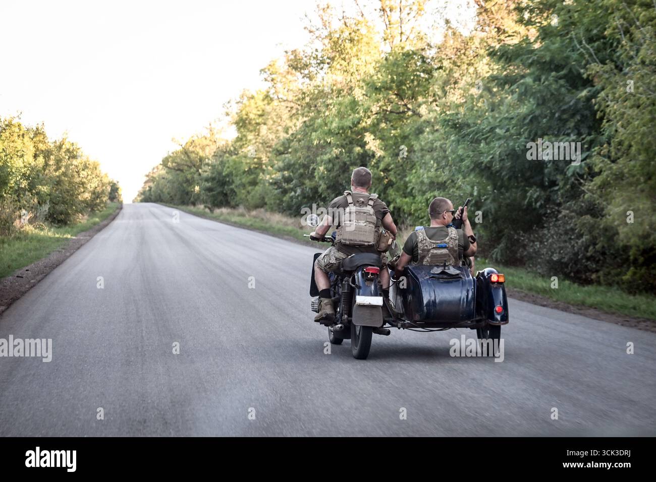 Soldiers from an artillery crew of Ukraine’s 141st Mechanized Brigade ...