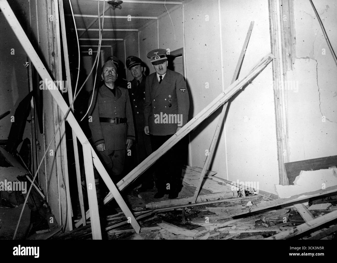Adolf Hitler (first from the right) shows Benito Mussolini (first from ...
