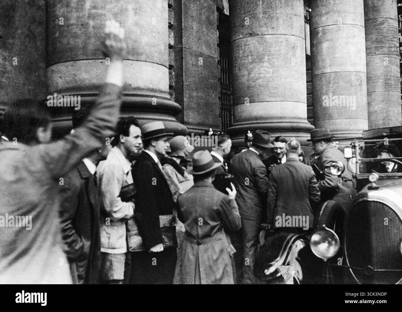 Adolf Hitler surrounded by journalists in front of the courthouse, 1930 ...