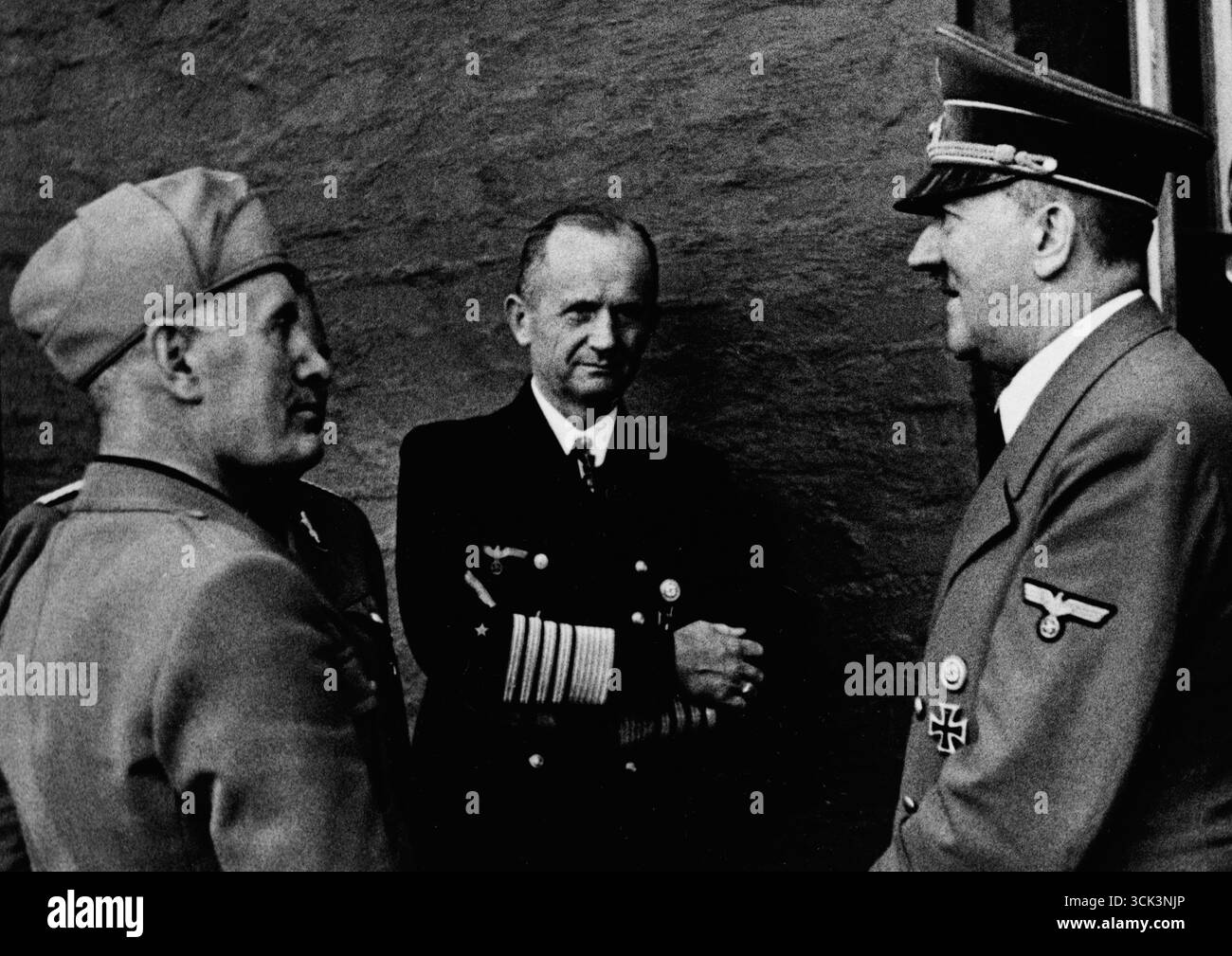 Benito Mussolini (first from the left), Karl Donitz (middle) and Adolf ...