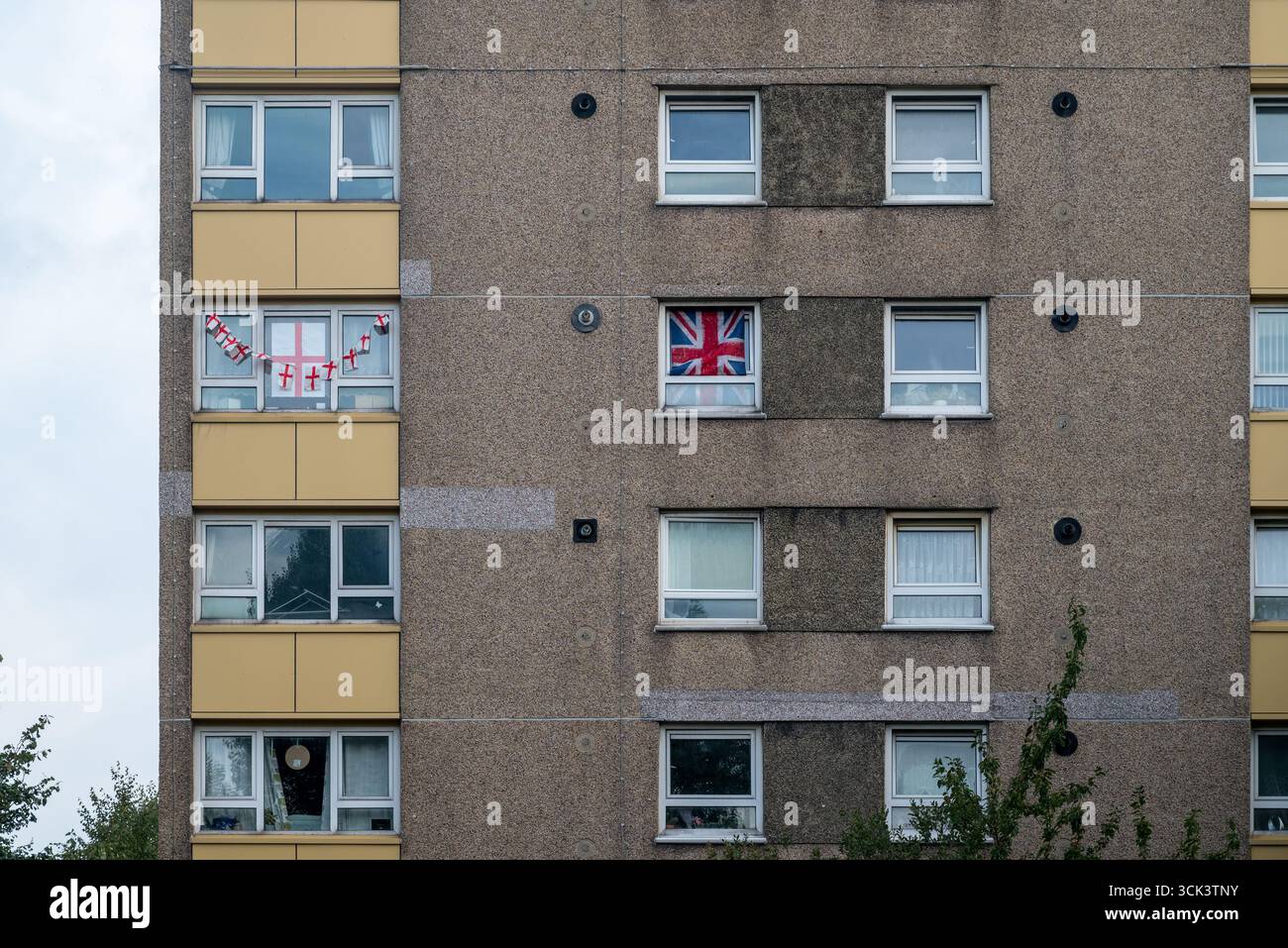 Union Jack flag in a window of a residential building in England to ...