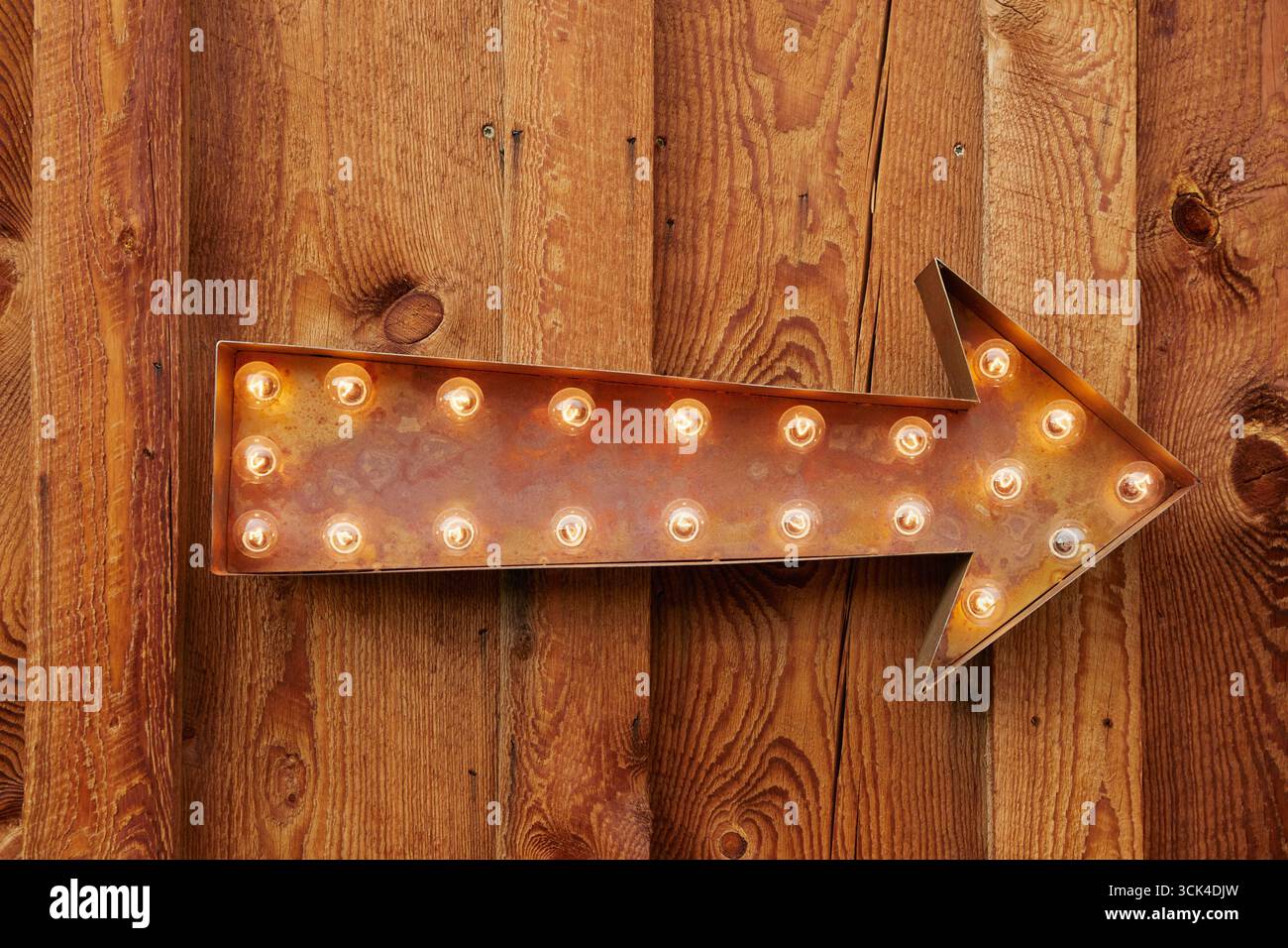Illuminated sign arrow hi-res stock photography and images - Alamy