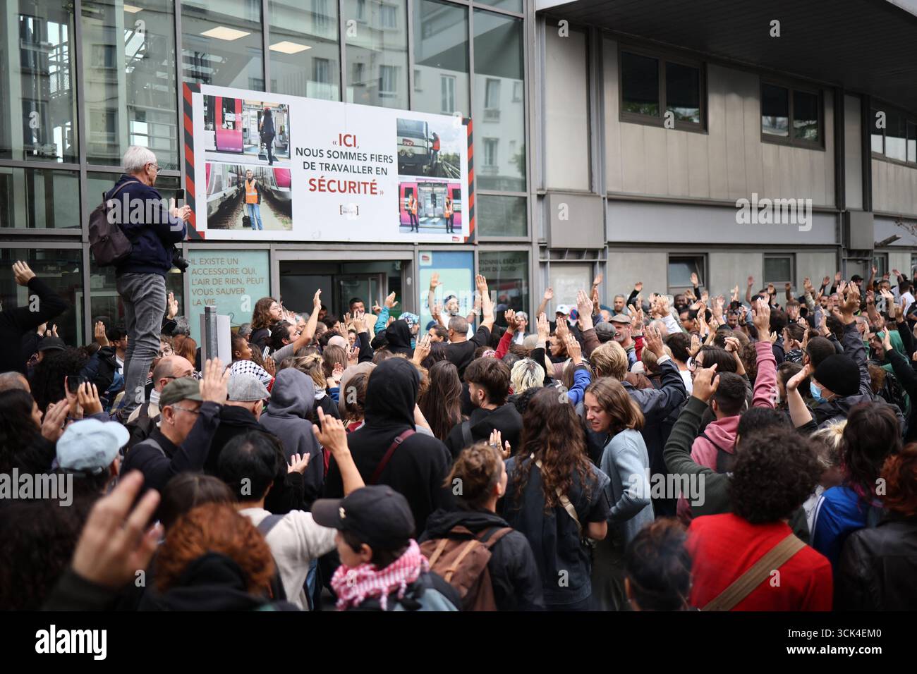 Protesters chant demonstrate near of the Gare du Nord train station in ...
