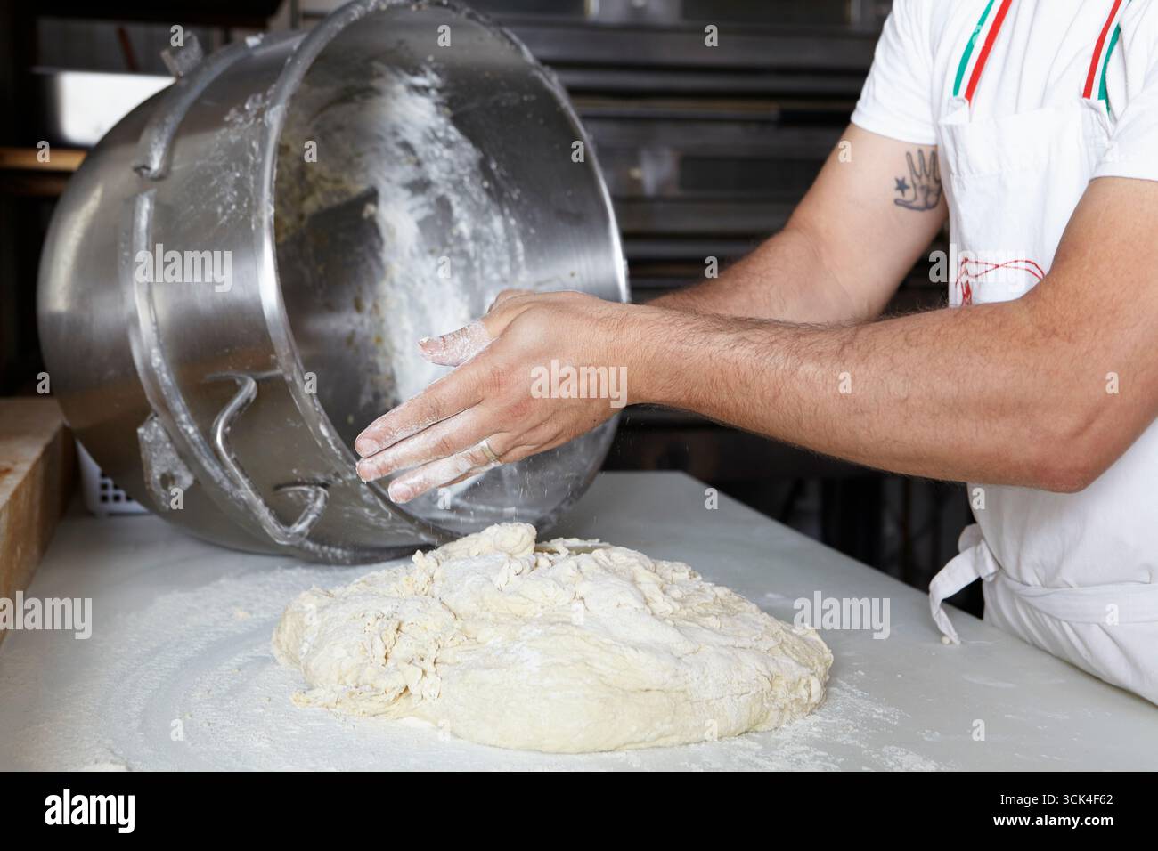 Baker In Bakery Making Bread Stock Photo Alamy