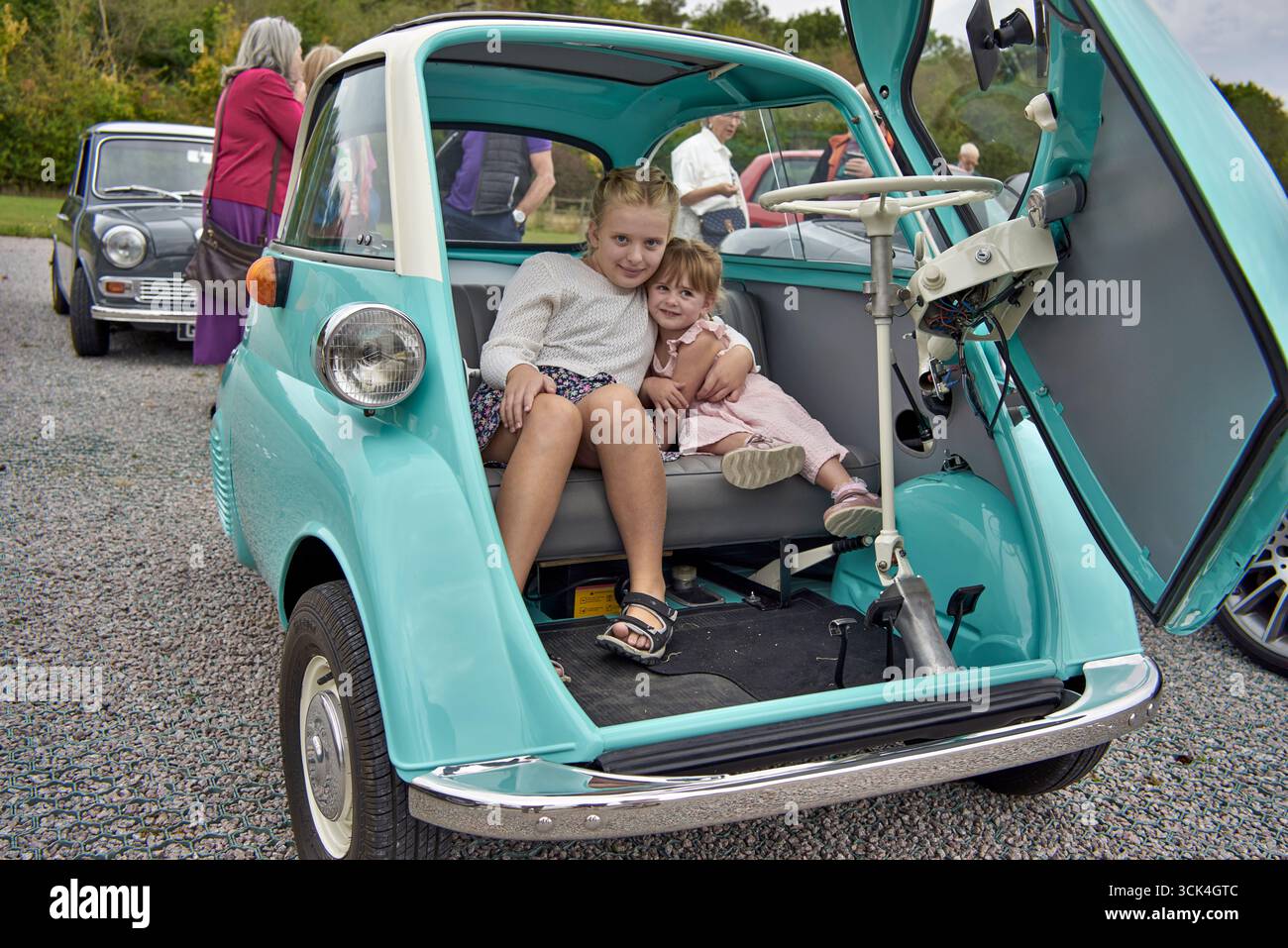 Isetta 1959 Italian bubble car with children sat inside demonstrating ...
