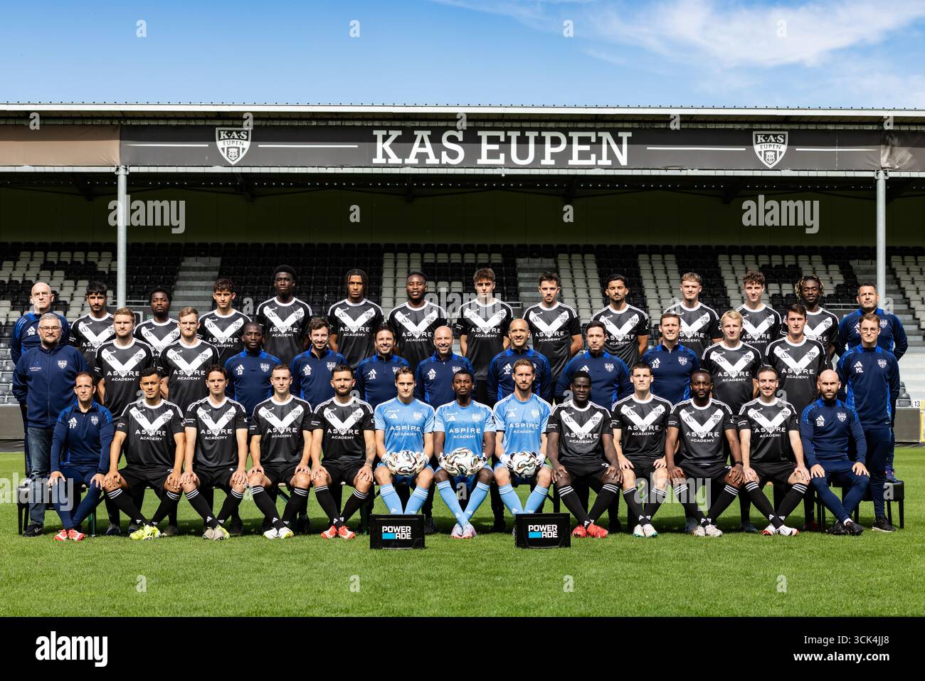 Eupen's players and stall pose for a team picture at the 2025-2026 ...