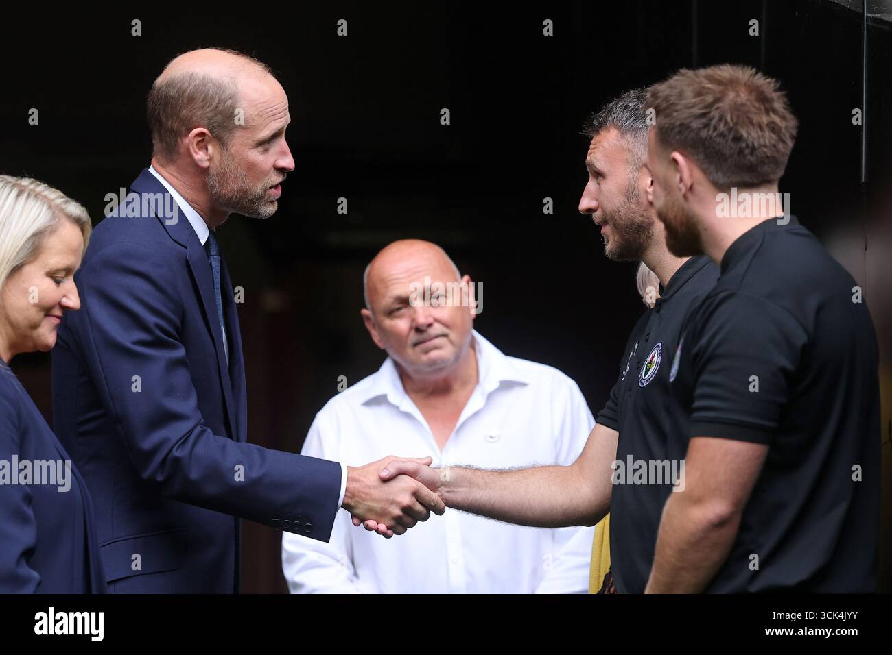 The Prince of Wales talks to Jesse Lewis, Jac Lewis' father, and ...