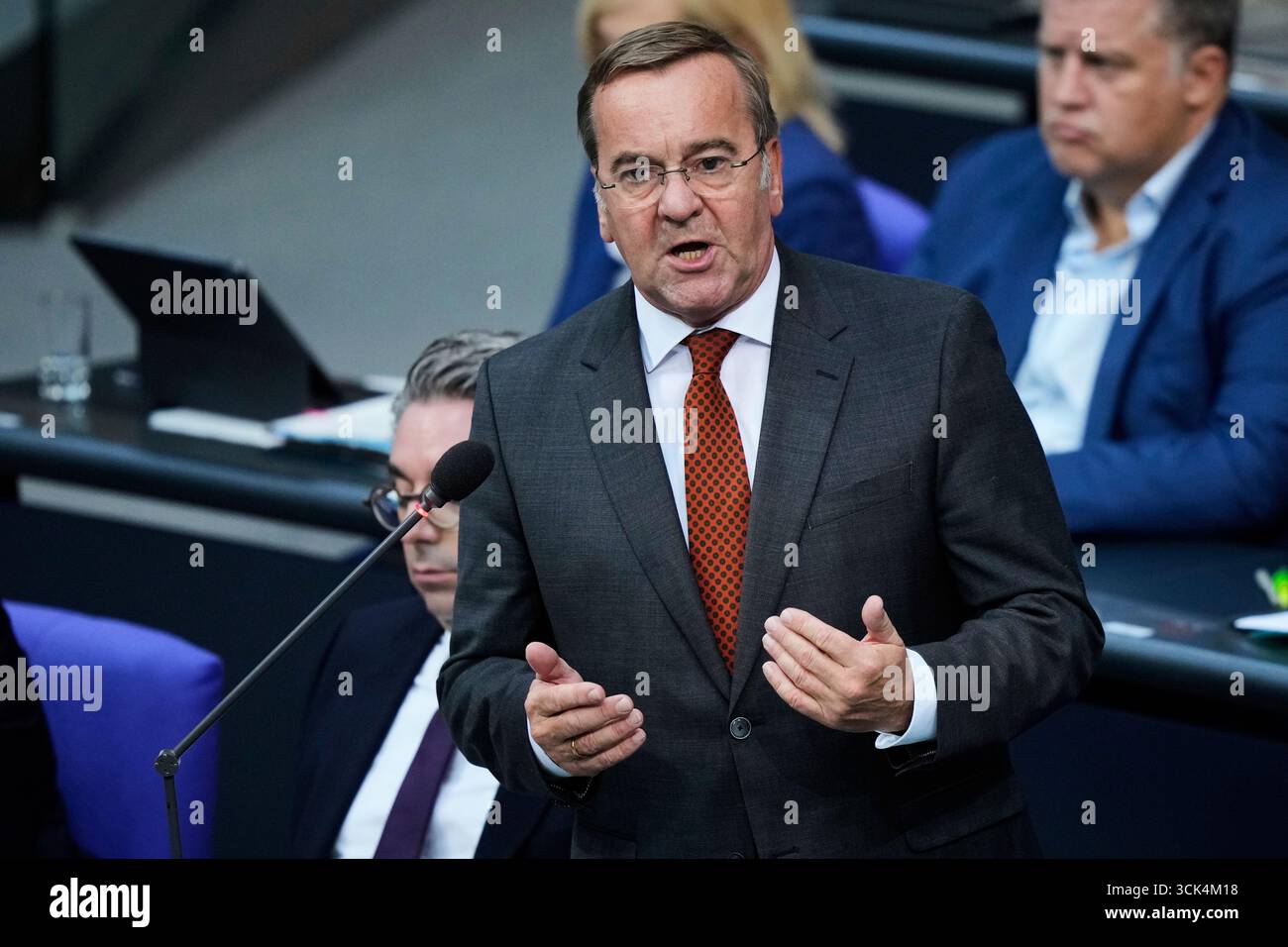 German Defence Minister Boris Pistorius, center, answers questions of ...