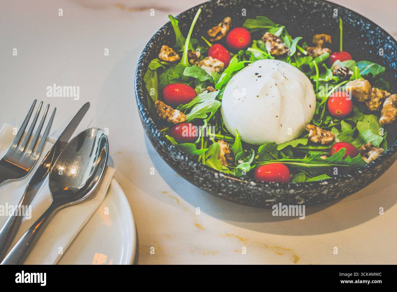 Creamy mozzarella burata with cherry tomatoes, arugula and candied ...