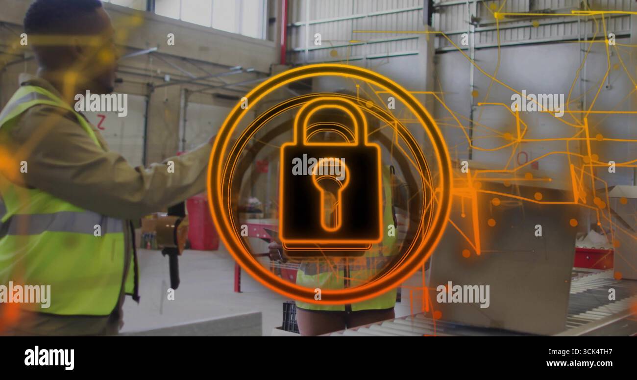 Workers wearing vests scanning boxes with scanner on warehouse conveyor ...