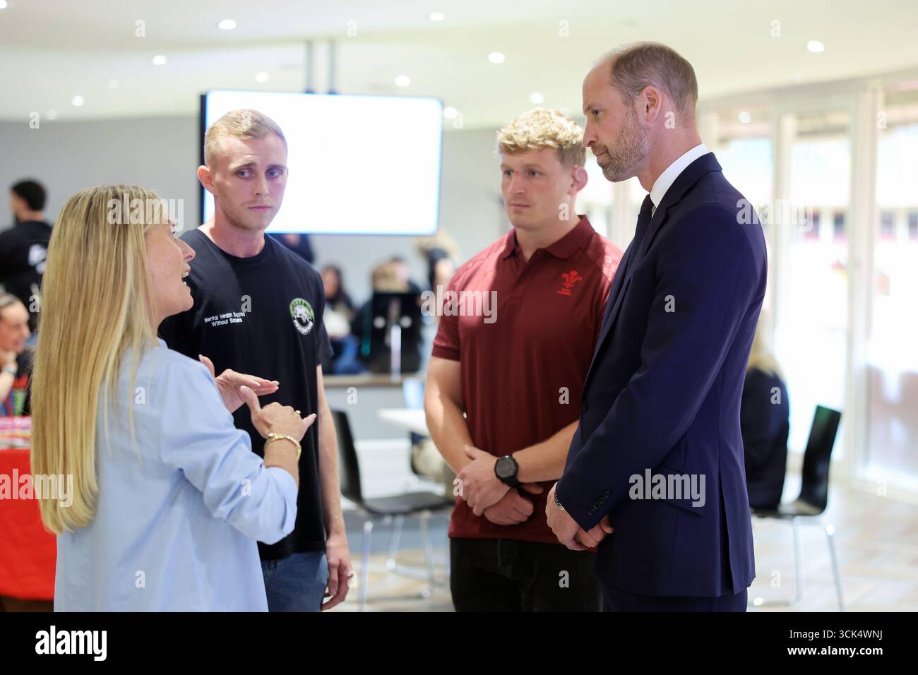The Prince of Wales meets teammates from Ammanford FC of Jac Lewis ...