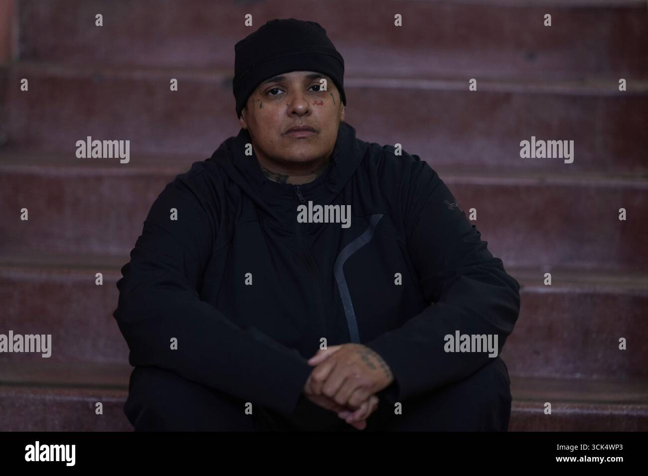 Maria Pires poses for a portrait at the shelter where she is staying in ...